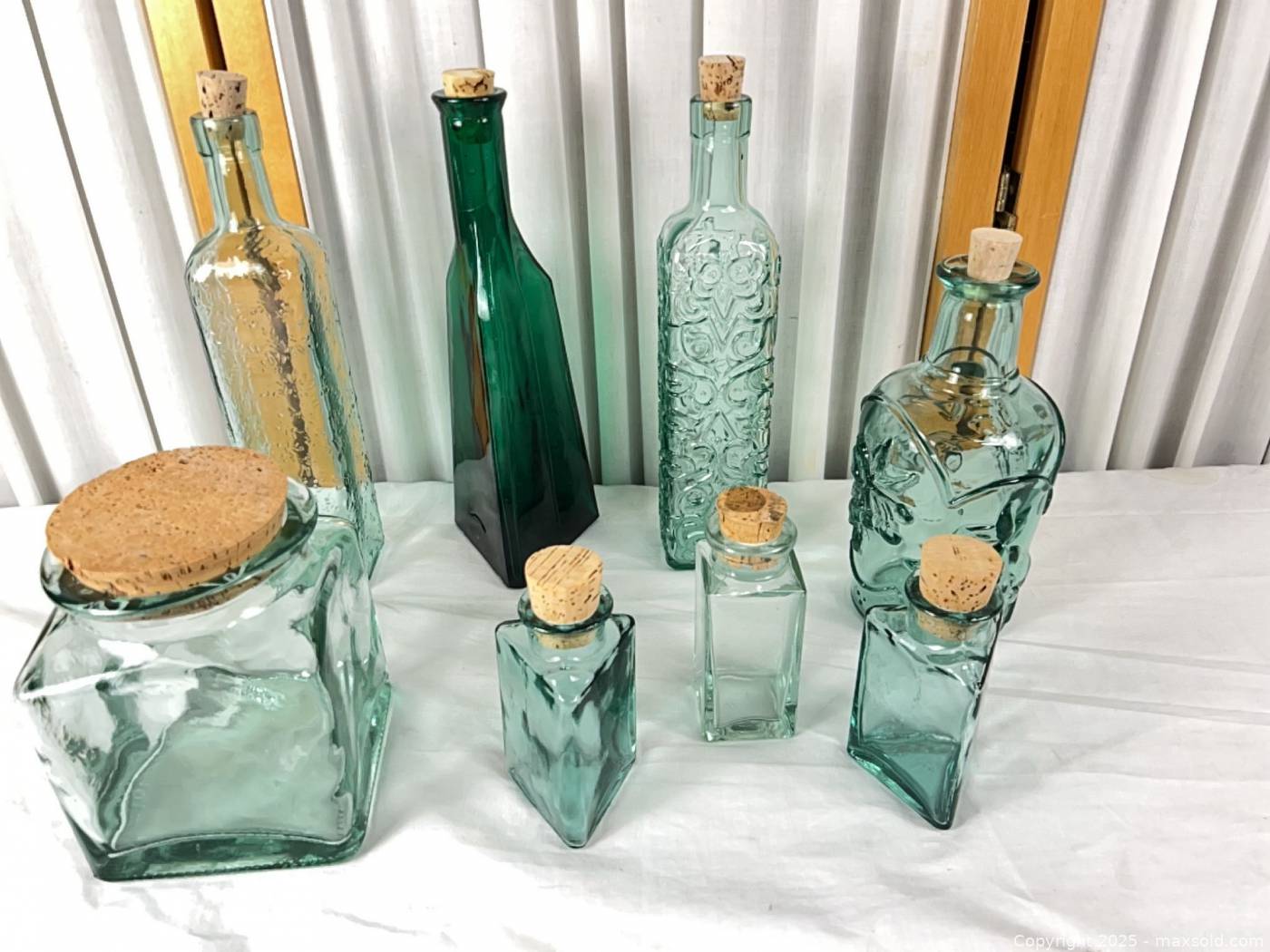 Ornately Embossed Green Tinted Glass Container Collection With Corks ...