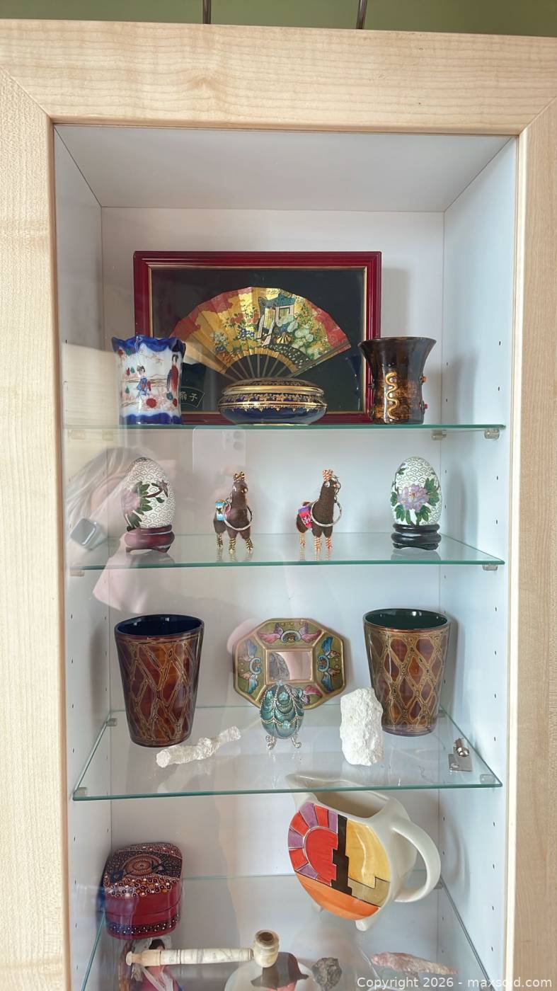 Tall Light Maple Curio Cabinet with Various Small Collectible Items ...