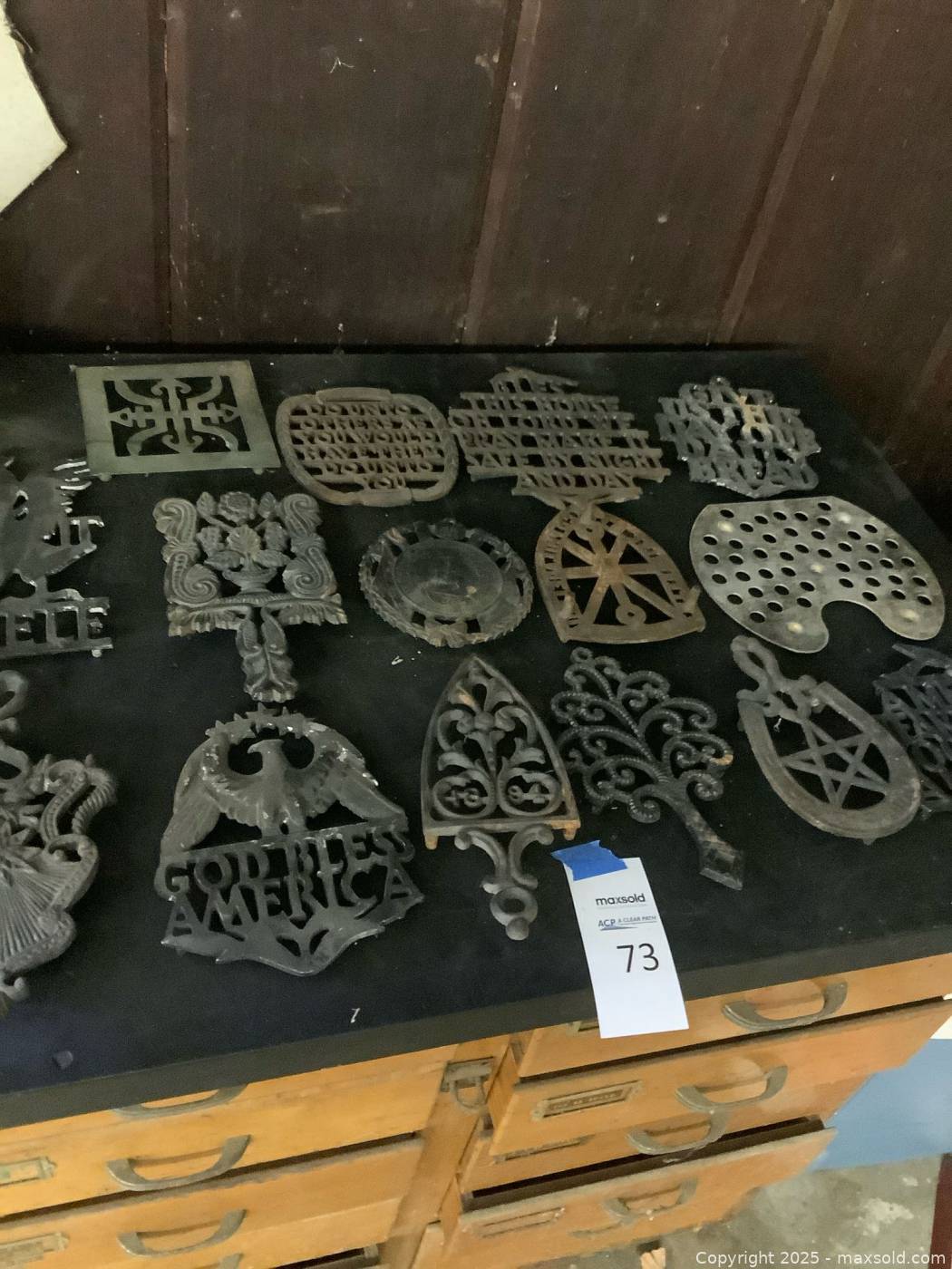 Vintage Cast Iron Decor Assortment with Patterns and Inscriptions ...